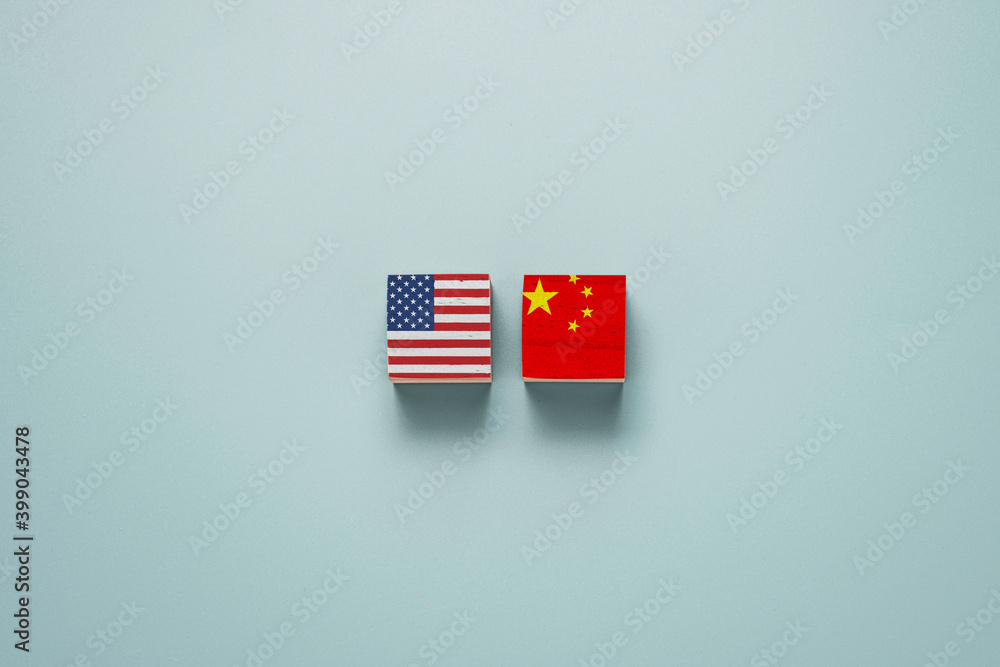 USA and China flag print screen on wooden block cubes with blue ...