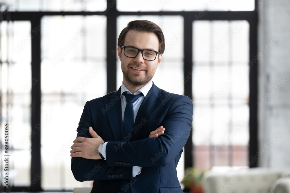 Head shot portrait smiling confident businessman wearing suit and ...