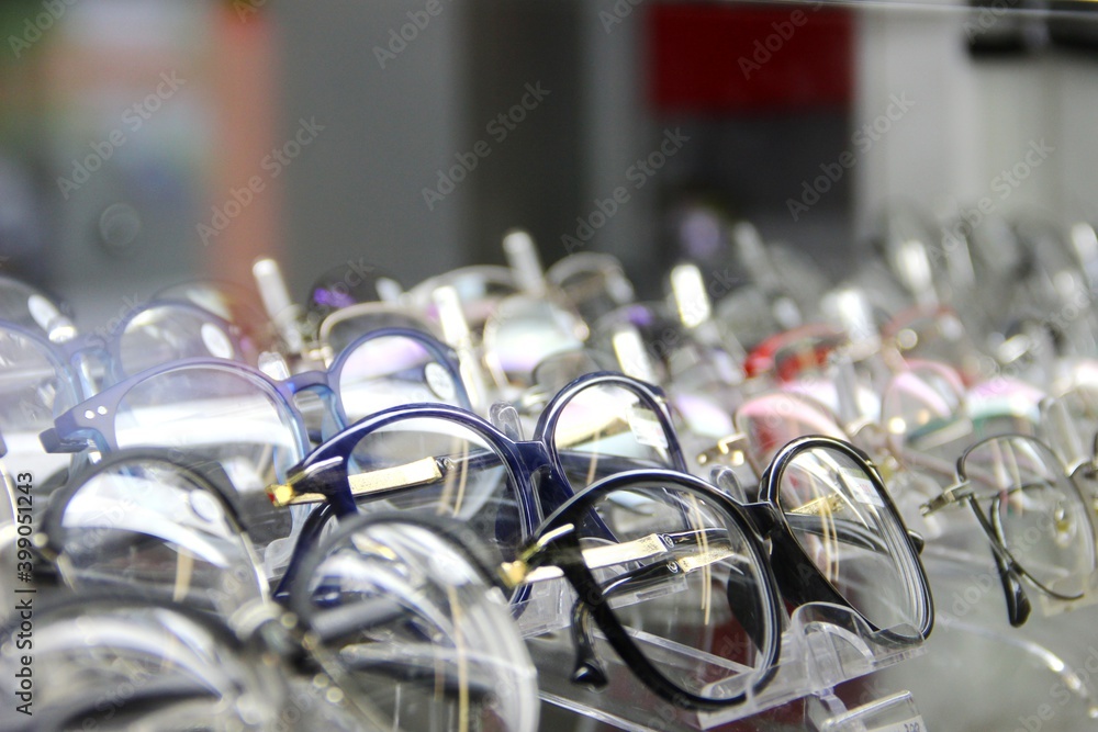 Eyeglasses in the window of a specialty optics store. Eyewear on window ...