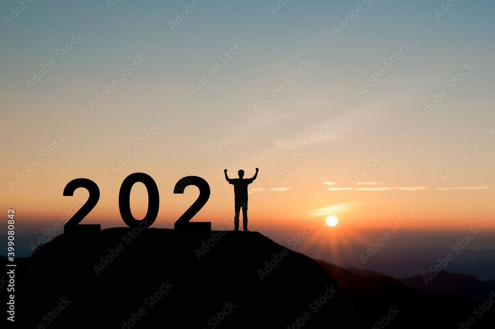 2021 New year Success concept. silhouette of a man with 2021 on the ...