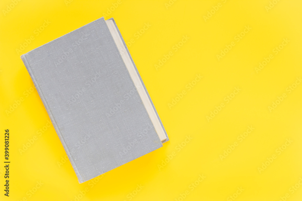 Ultimate gray book on illuminating yellow background. Trend color of ...