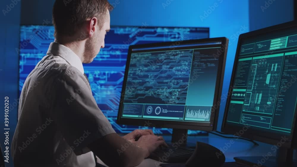 Workplace of an engineer developing a microchip. Professional coder ...