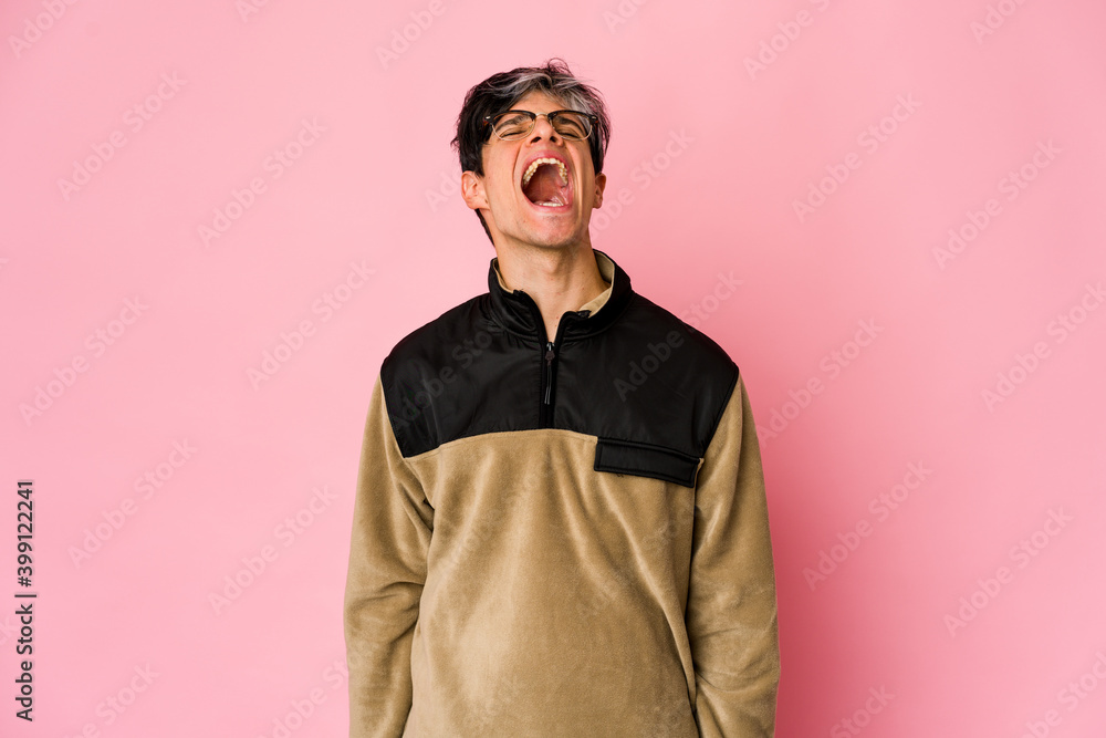 Young skinny hispanic man shouting very angry, rage concept, frustrated ...