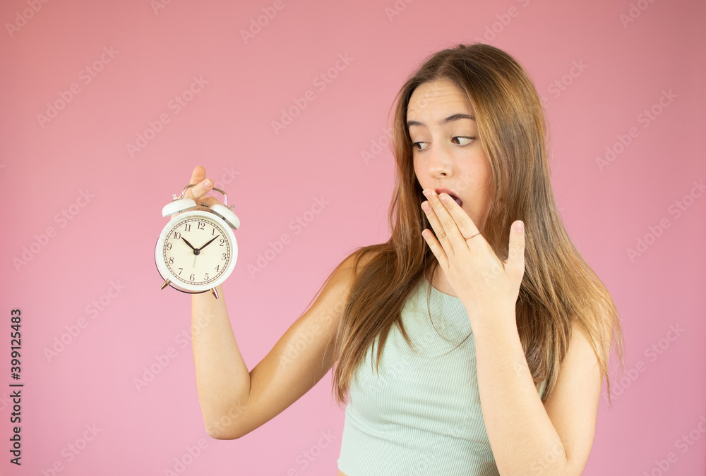 young pretty woman looking very shocked or surprised, staring with open ...