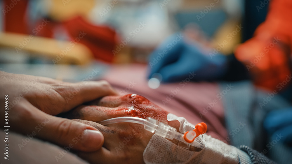 Close Up Shot of Professional Paramedic Providing Medical Help to an ...