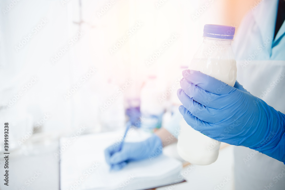 Quality control test of milk in laboratory. Dairy factory industry ...