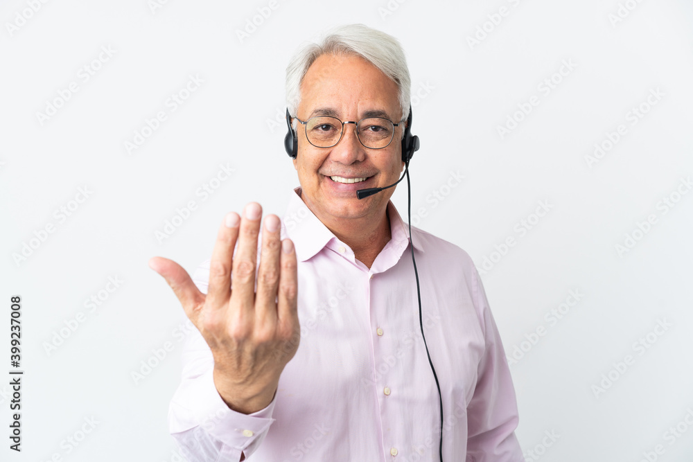 Telemarketer Middle age man working with a headset isolated on white ...