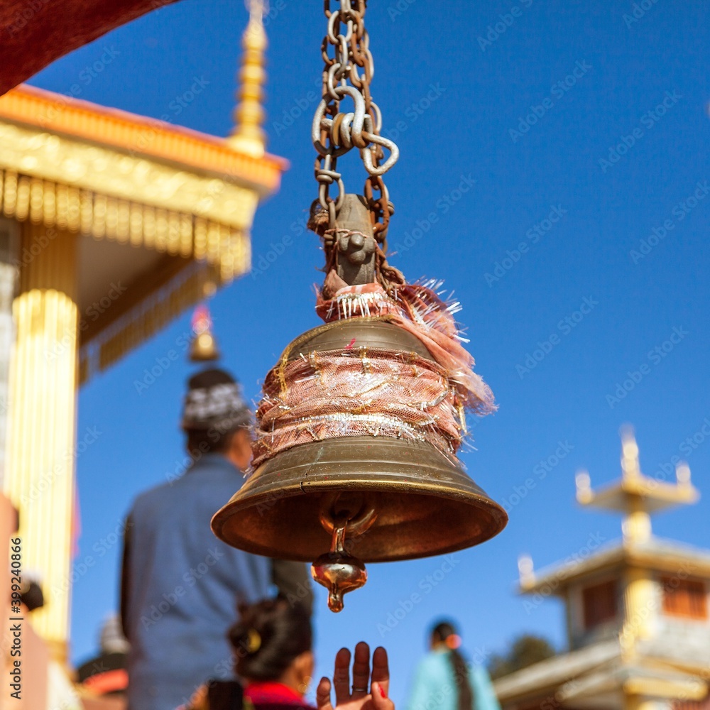 Bronze bell in Surkanda Devi Mandir Hindu temple Stock Photo | Adobe Stock