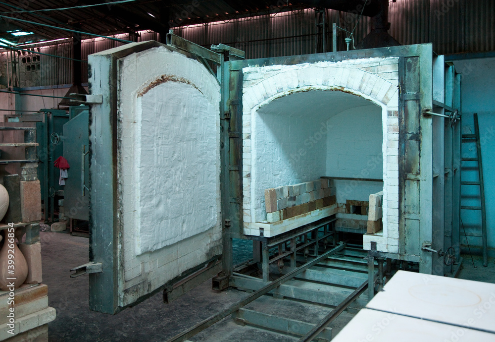 Clay oven with open door in pottery. Stock Photo | Adobe Stock