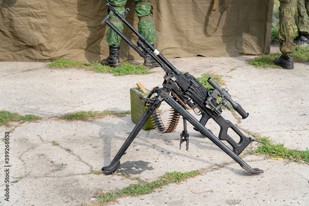 A light machine gun on bipod with telescopic sights. Russian weapon ...