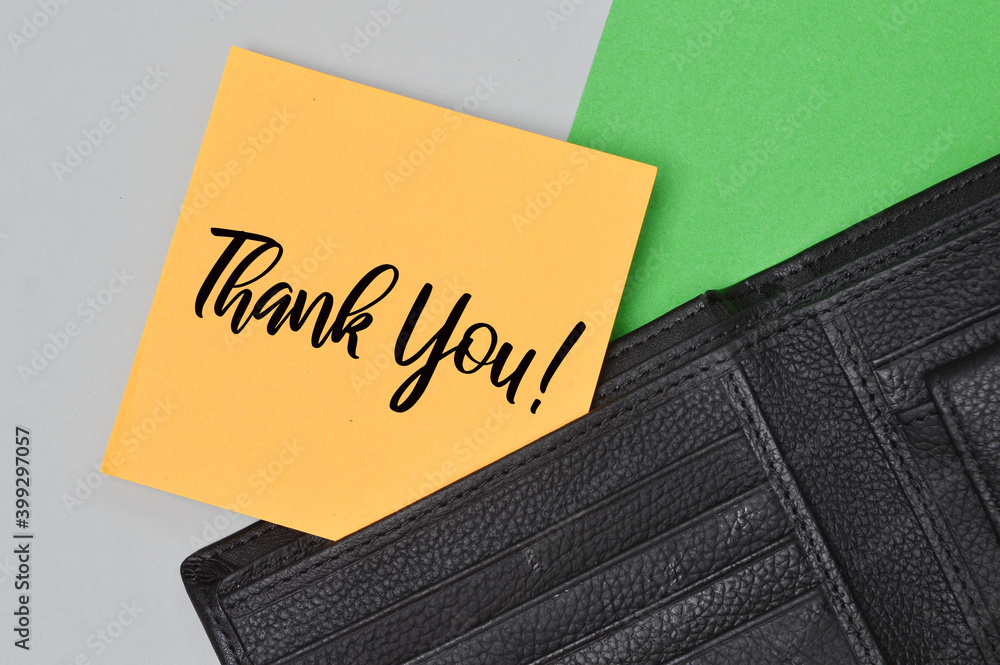 Top view of wallet and memo note written with text THANK YOU!. Stock ...