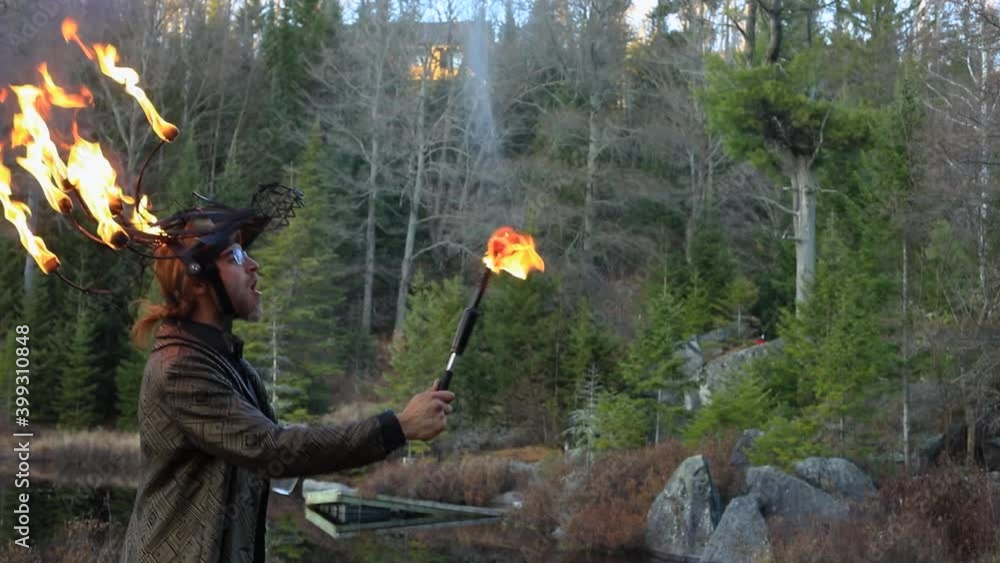 Vidéo Stock Handsome male with long hair wearing dragon helmet with ...