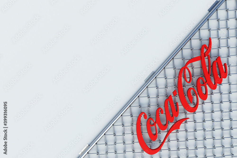 Coca-Cola logo of red color on metal grid and white background ...