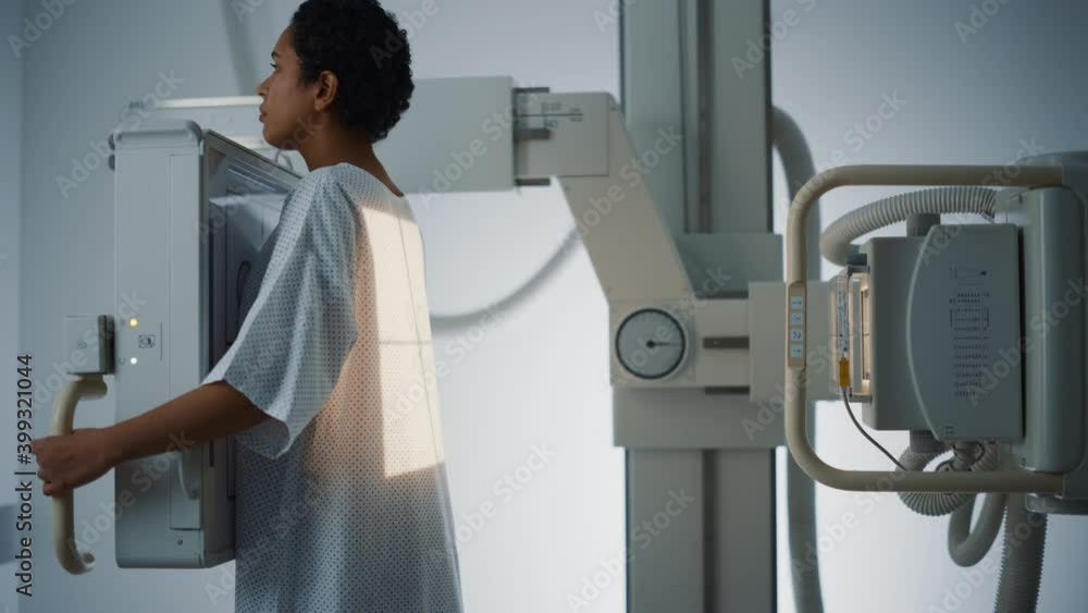 Hospital Radiology Room: Beautiful Latin Woman Standing while ...