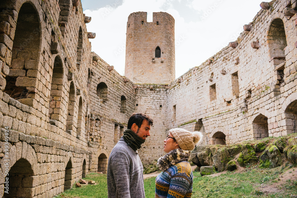Couple stare at each other inside an abandoned castle. Adventure ...