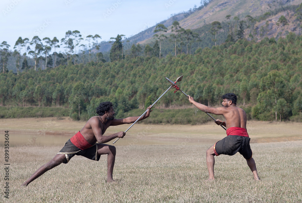 Indian fighters performing Aayudha Payattu, Weapon Combat during ...