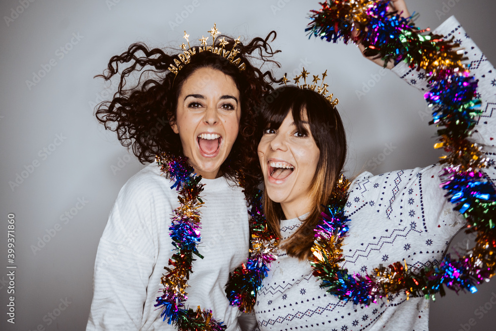 .Two beautiful women saying goodbye to the year 2020 in pajamas from ...