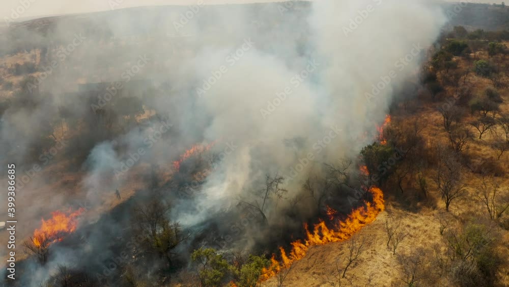 Climate emergency.Aerial view of a grass fire in Southern Africa caused ...
