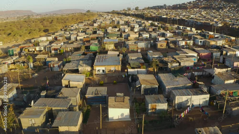 Close-up aerial fly over view of the densly over crowded and populated ...