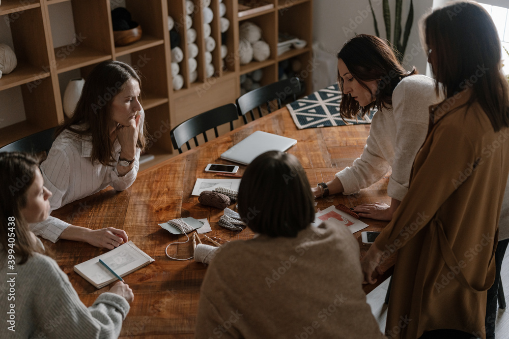 Women's team creating designs in the office Stock Photo | Adobe Stock