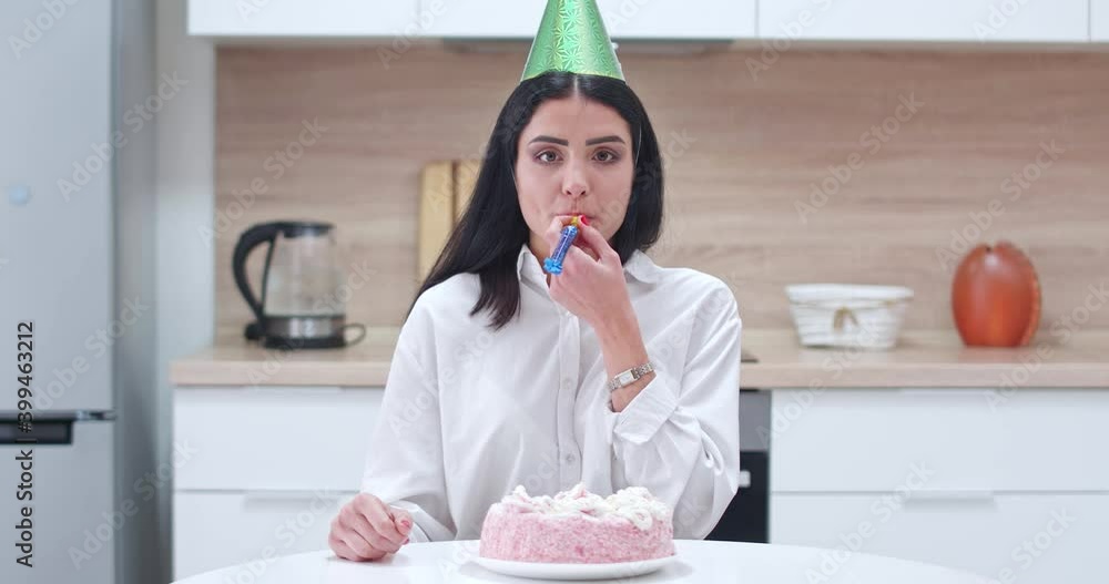 Holiday during a pandemic, a girl falls face first into a cake looks at ...