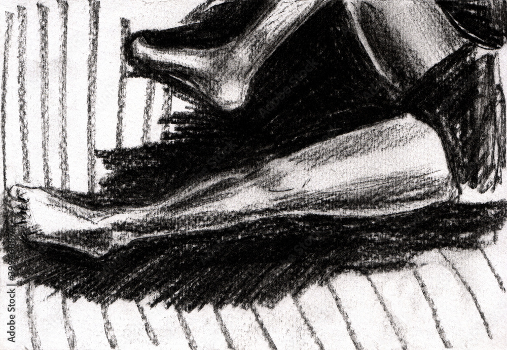 Charcoal hand drawn male legs on the bed. Rough strokes, black and ...