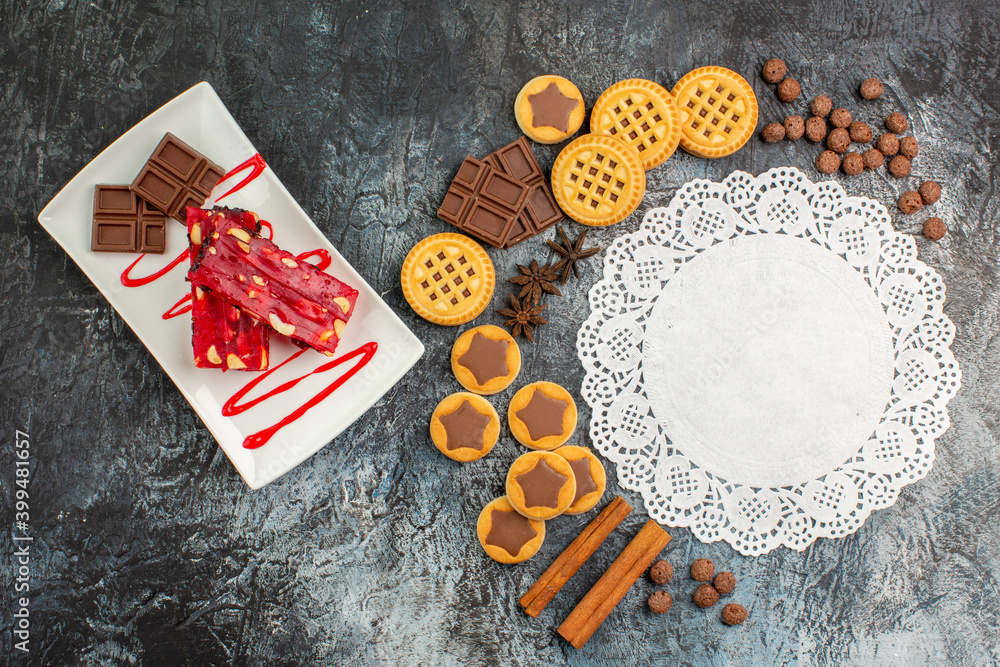 white lace with crescent shaped layout of sweets and a plate of ...