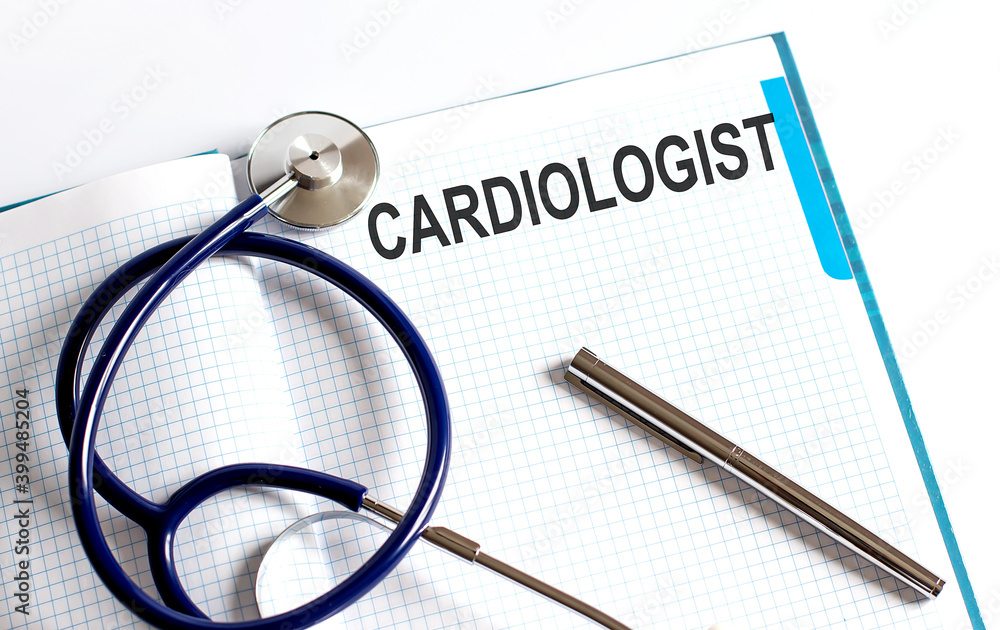 Paper with text CARDIOLOGIST on table with stethoscope Stock Photo ...
