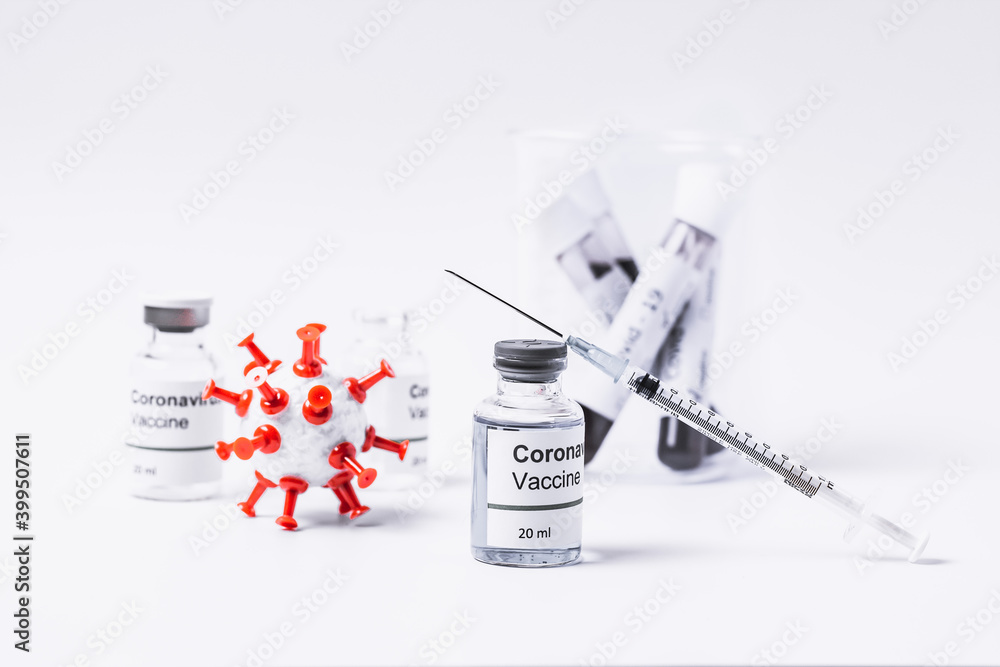 Covid -19 vaccine vial and injection syringe isolated on white ...