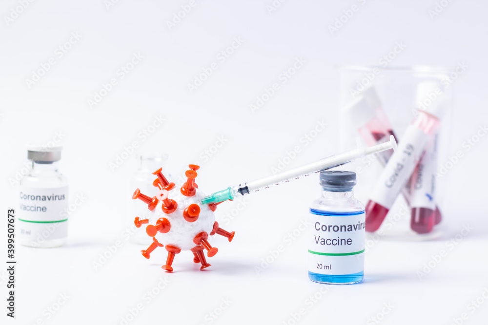 Covid -19 vaccine vial and injection syringe isolated on white ...