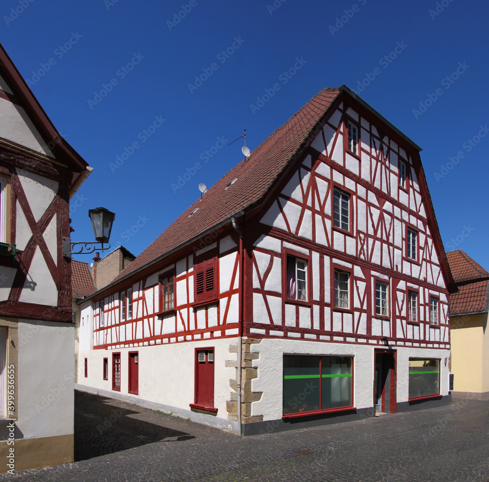 Half-timbered residential house with commercial use in the ground floor ...