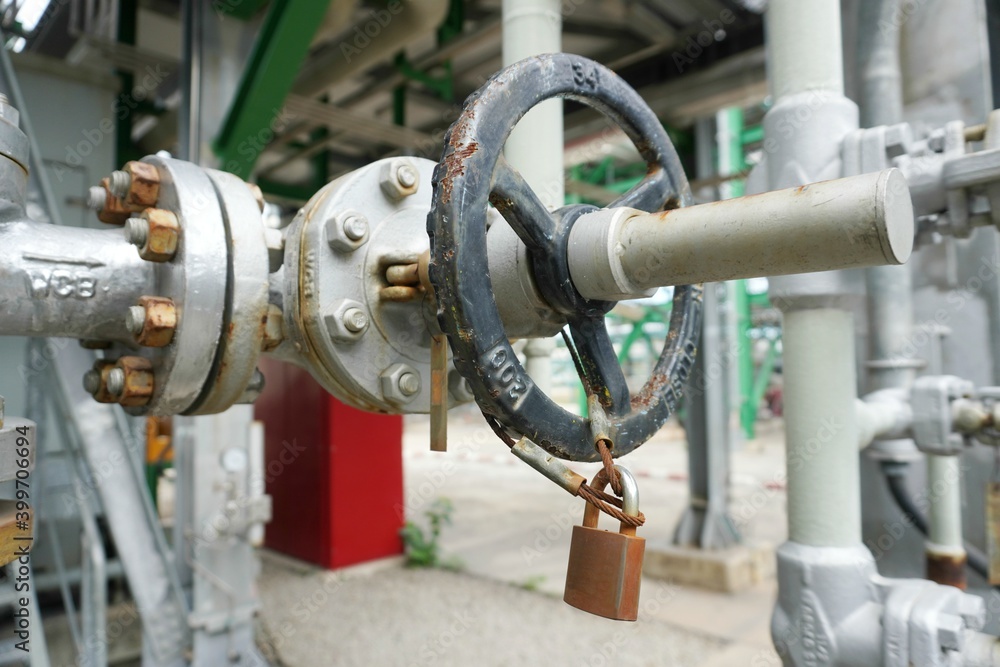 Key lock and chain to prevent the valve being opened is part of the ...