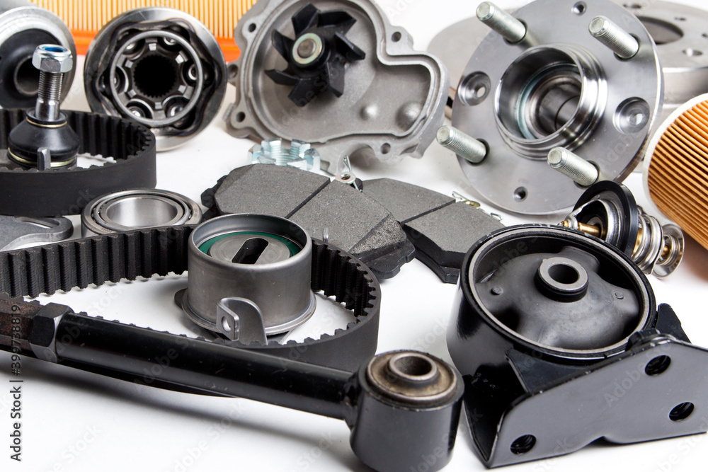 New car parts background .Hub, pump, brake pads, filter, timing belt ...