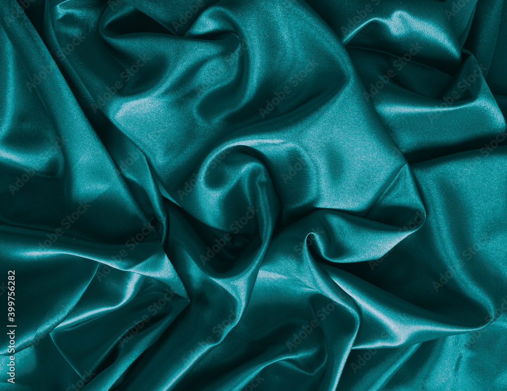 Elegant smooth blue green satin, silk fabric drapes. Luxurious cloth ...