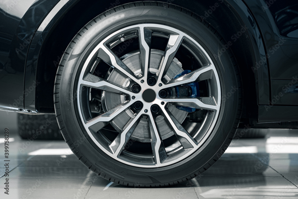 Aluminium rim of luxury car wheel close up Stock Photo | Adobe Stock