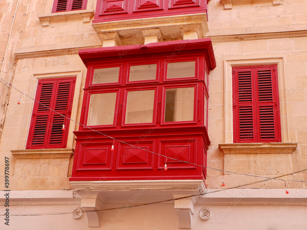 Maltese typical red balcony and windows in Valletta, Malta. Simple ...