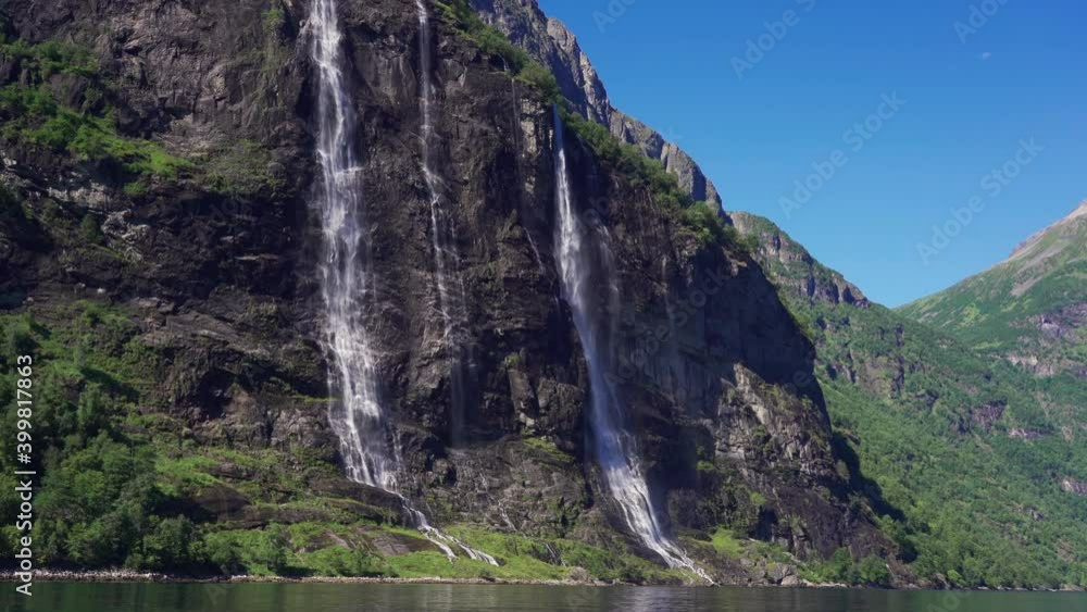 The Sven sisters waterfall - an iconic feature of the Geiranger fjord ...