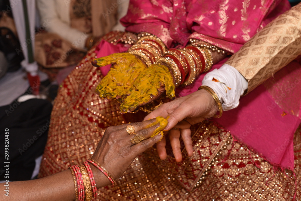 Haldi Being applied on Bride's Hand during Marriage - A Hindu Wedding ...