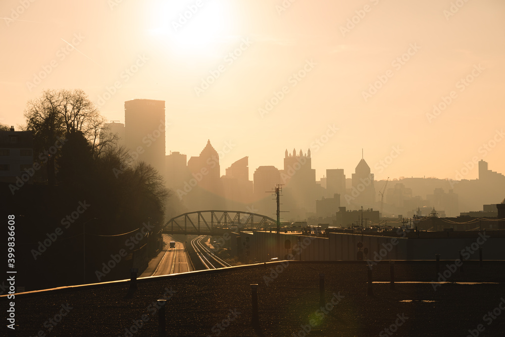 Urban cityscape with the skyline of Pittsburgh with hazy warm ...