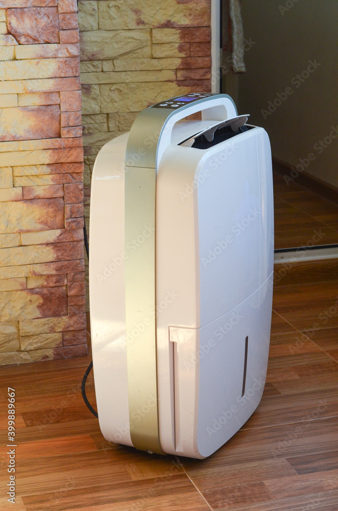 dehumidifier in the room close up, modern technology for the climate in ...