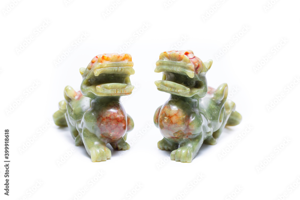 Pair of jade stone Pixiu Dragon Feng Shui sculptures. Pixiu are a ...