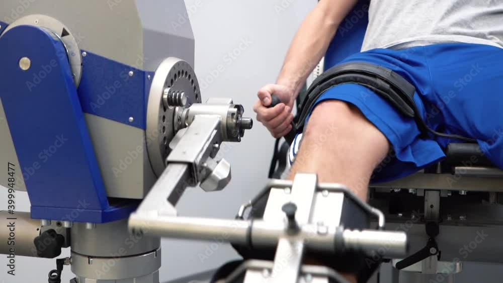 Athlete using professional Recovery equipment to reduce knee trauma at ...