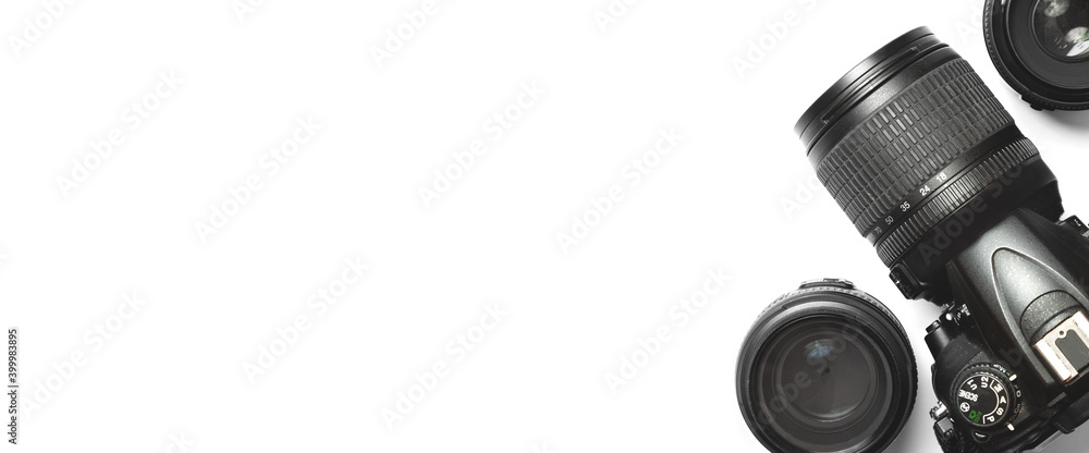 top view of digital camera and lens on white background. Equipment ...