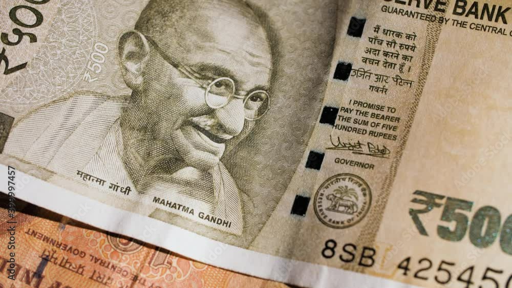 Rotating close up of an Indian 500 Rupee bill with face of Mahatma ...