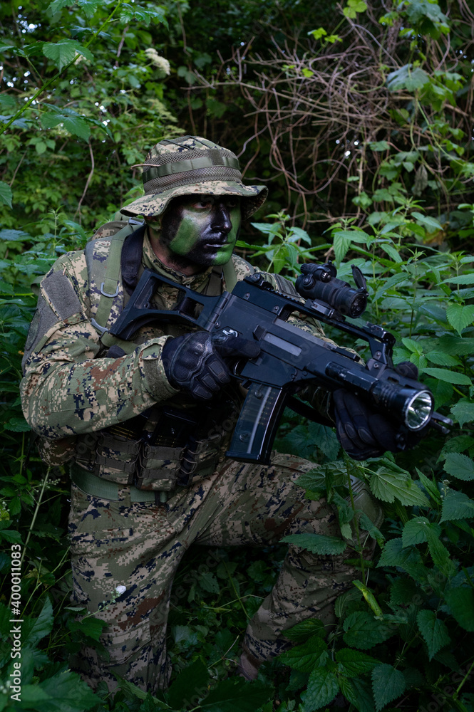 Croatia recon forces soldier camouflaging in the forest with the Cropat ...