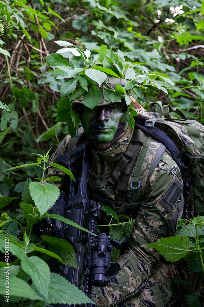 Croatia recon forces soldier camouflaging in the forest with the Cropat ...