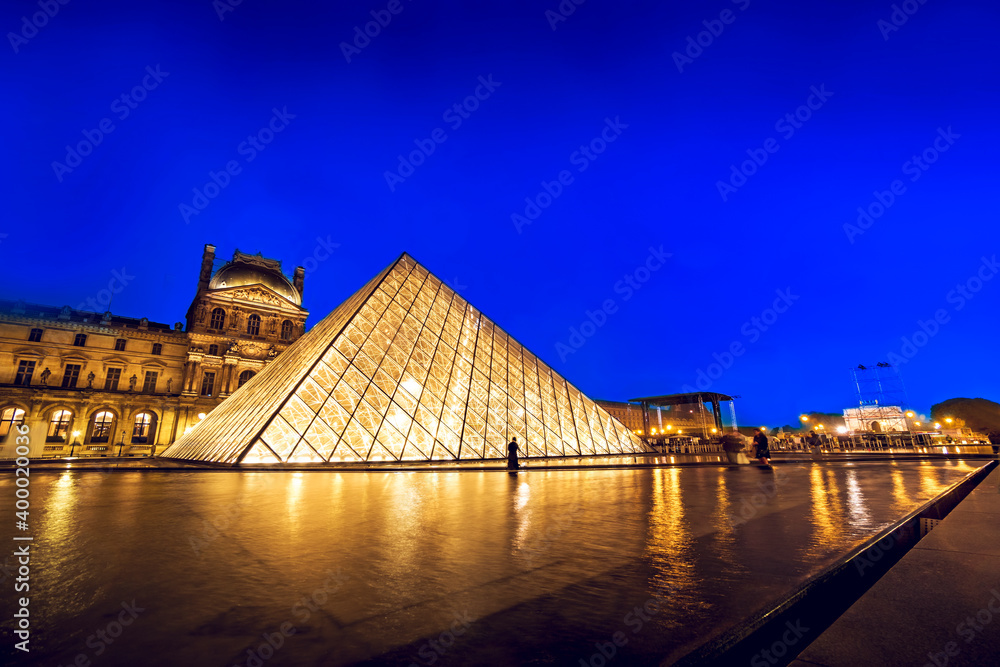Paris, France - circa May, 2017: Louvre Pyramid at Louvre Museum is one ...