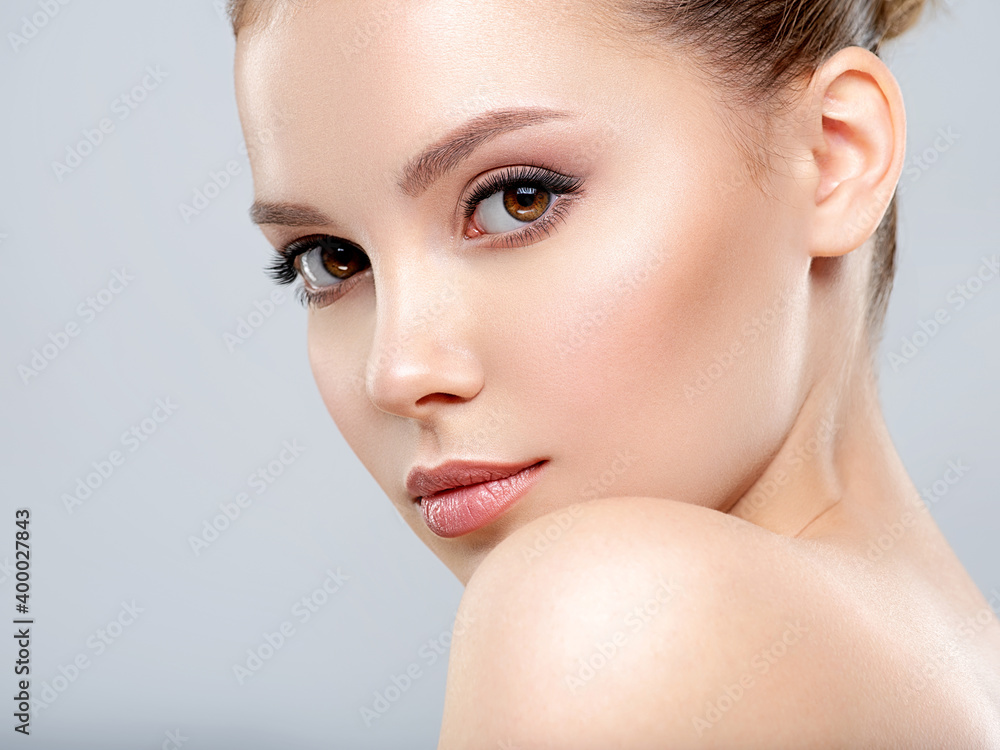 Closeup portrait of a face of the young pretty girl with a healthy skin ...
