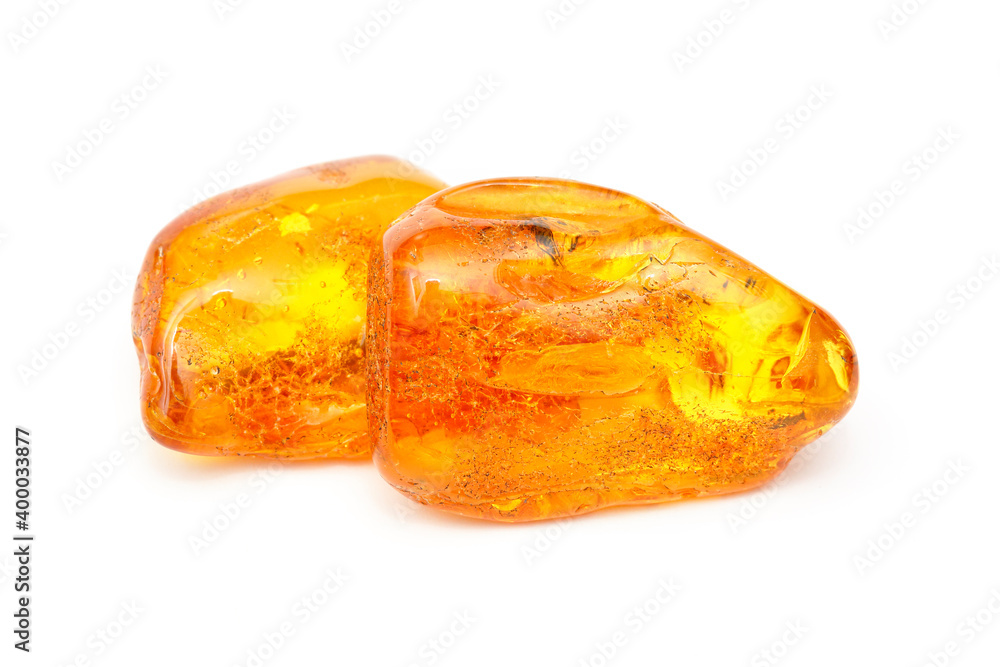 Yellow amber with inclusions on a white background. Natural mineral ...