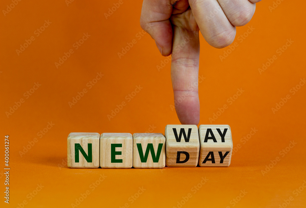 New way symbol. Hand turns cubes and changes words 'new day' to 'new ...